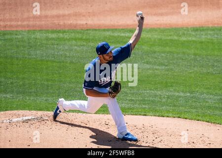 Los Angeles Dodgers pitcher Alex Wood looks on during spring training ...