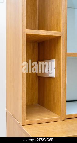 An empty wardrobe with a socket Stock Photo - Alamy