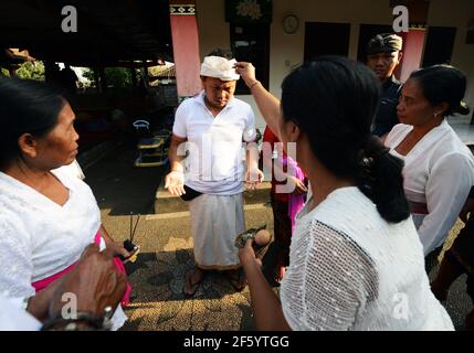 A Pre marriage blessing ceremony in a small Hindu temple in Ubud, Bali ...