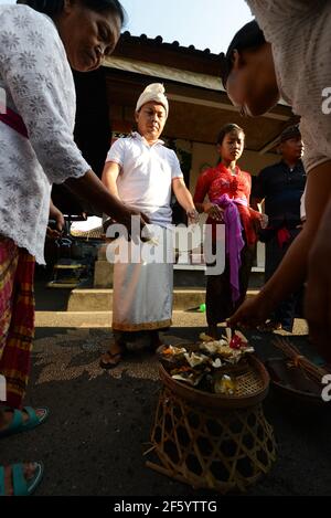 A Pre marriage blessing ceremony in a small Hindu temple in Ubud, Bali ...
