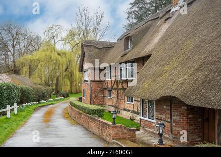 The thatched 17th century Grade II listed 'Inglenook Cottage', a timber ...
