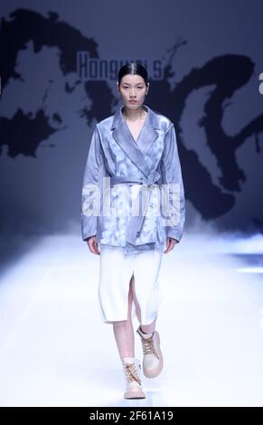 BEIJING, CHINA - MARCH 29, 2021 - A boat rides on the lake of Yuyuantan ...