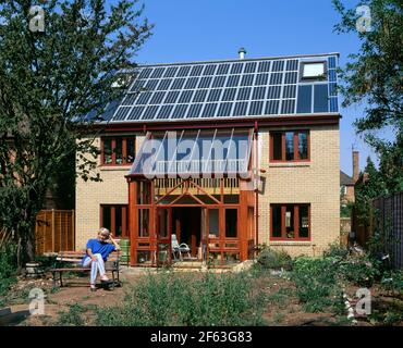 house with built-in solar cells. Alternative energy, resource saving ...