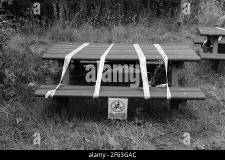 Taped up chairs in lockdown Stock Photo - Alamy
