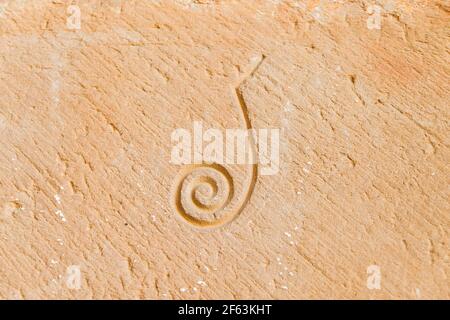 Stonework mark or symbol on the stone wall of the 12th century ...