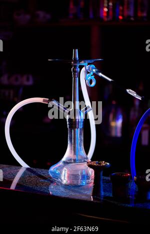 group of eastern hookahs on table close-up Stock Photo - Alamy