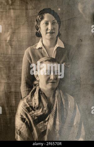 GERMANY - CIRCA 1930s: Vintage photo shows woman in a photography ...