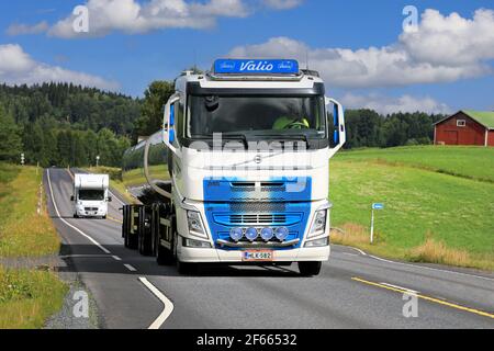 White Volvo FH milk tank truck Rahkonen delivers Valio milk near Valio ...
