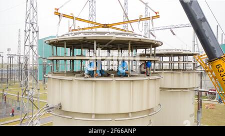 SUZHOU, CHINA - MARCH 4, 2021 - A construction worker checks sulfur ...