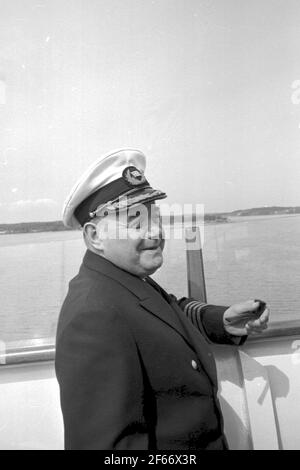 Åland trip. M/S Nordia. Sea captain and mate on the comando bridge ...