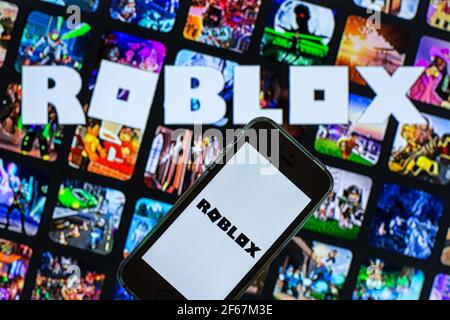 In this photo illustration, the Roblox app seen displayed on a ...
