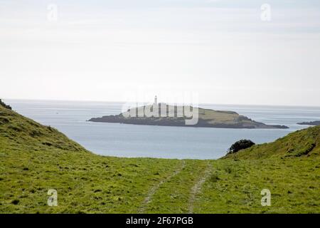 Little Ross Island and lighthouse viewed from Torrs Point at the mouth ...