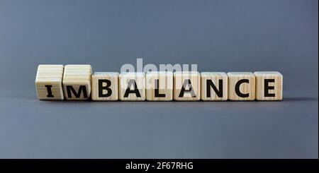 Balance or imbalance symbol. Turned cubes and changed the word ...