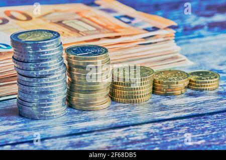 Stacks of Euro banknotes in different denominations Stock Photo - Alamy