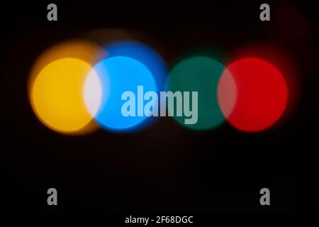 Four different lights as bokeh blurred Stock Photo - Alamy