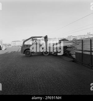Wood and cable load with truck.liljeholmens rail yard Stock Photo - Alamy