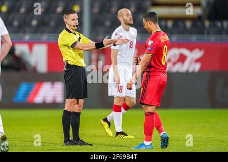 LEUVEN, BELGIUM - MARCH 30: referee Donatas Rumsas and Jeremy Doku of ...