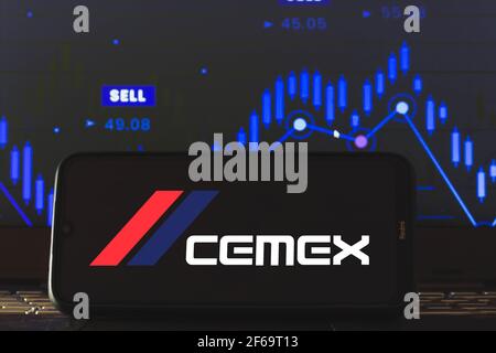In this photo illustration a Cemex logo of a building material company ...