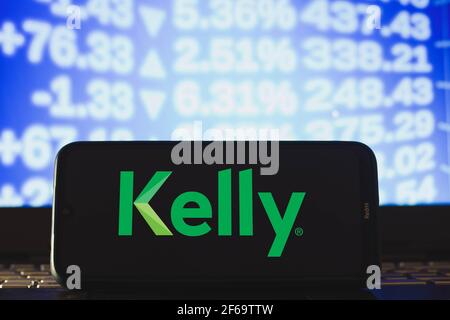 In this photo illustration Kelly Services logo seen displayed on a ...