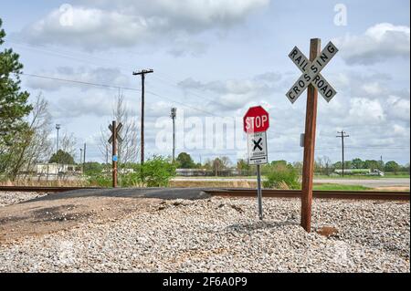 Unguarded railroad crossing Stock Photo - Alamy