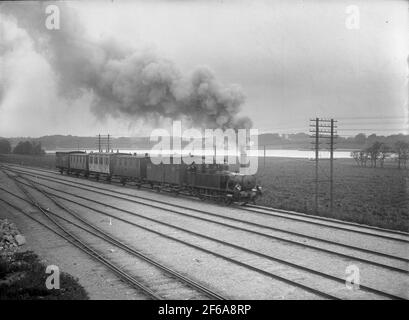 Myj Lok 29. Steam locomotive with old passenger cars. The locomotive ...