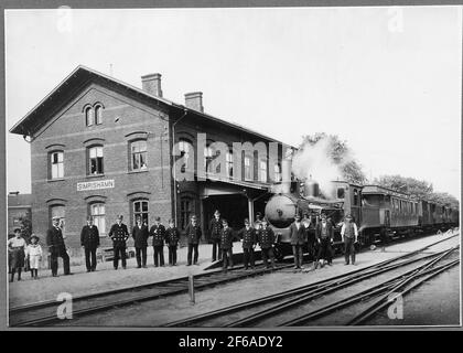 Staff at Simrishamn station. Malmö-Simrishamns Railway, MSJ Lok 15 with ...