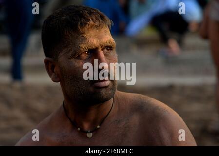 Pakistani Traditional wrestlers or Pehalwans are busy practicing at an ...