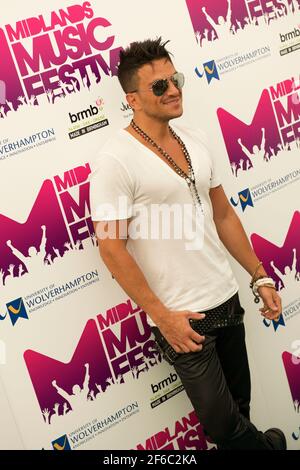 Pop singer Peter Andre poses with a CD of his latest single 'Defender ...