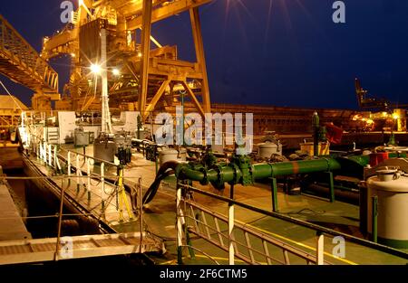 Small ship that loads fuel for the supply of large ships at sea Stock ...