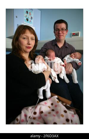 Cathy Koester and Matt Calais with their triplets Ivy(foreground), Moly ...