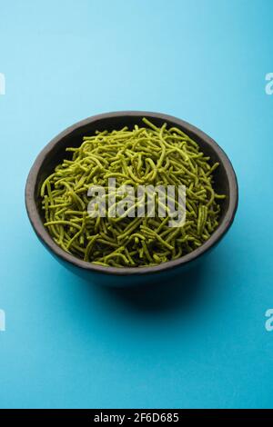 Spinach or palak sev are crunchy fried savory noodles. Homemade Thick ...