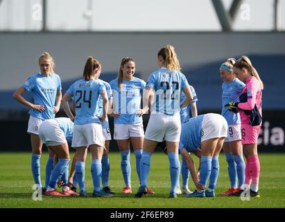 Manchester City players players huddle before the during the Emirates ...