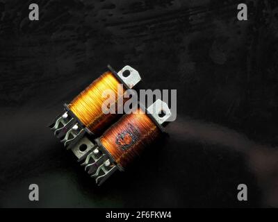 Burnt power transformer with copper winding Stock Photo - Alamy