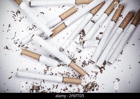 The concept of the fight against smoking and nicotine addiction. A man ...