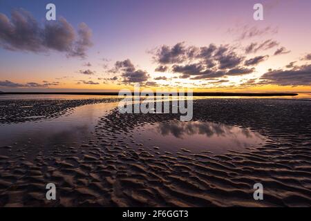 Dramatic sunrise with a pink sky at Carmila Beach, Queensland, QLD ...