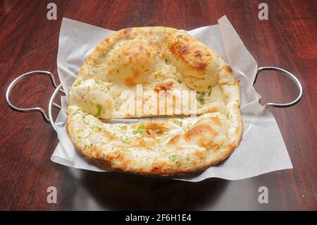 Delicious Afghan or Indian dish known as garlic naan Stock Photo - Alamy