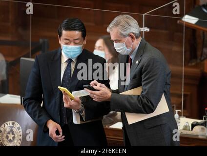 Texas State Rep Gene Wu, D-Houston, listens to a debate on a voting ...