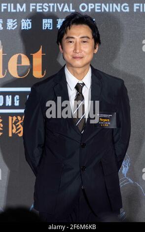 Hong Kong actor Patrick Tam poses as he arrives for the 2015 Emperor Group Annual Celebration in ...