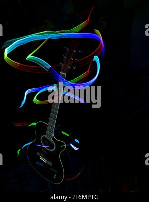 Painting LED light in the dark with long exposure shot Stock Photo - Alamy