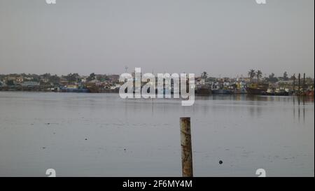 basra, Iraq - april 27, 2018: photo of boat in the river in basra city ...