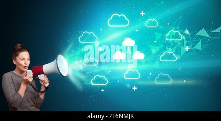 Young person with megaphone and technology related icon Stock Photo - Alamy
