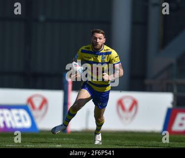 Daryl Clark of St. Helens makes a break during the Betfred Super League ...