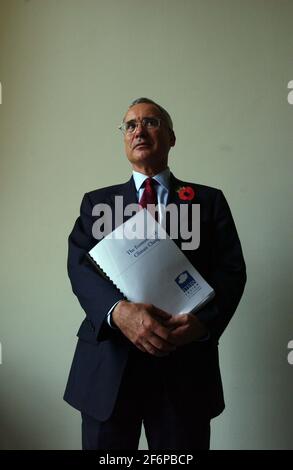 SIR NICHOLAS STERN HOLDING A COPY OF HIS REPORT ON THE ECONOMICS OF ...