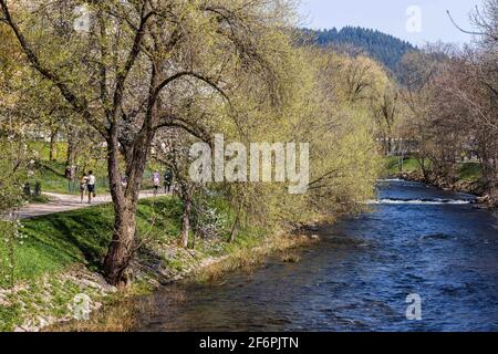Freiburg, Germany. 02nd Apr, 2021. Three women sit on blankets on the ...