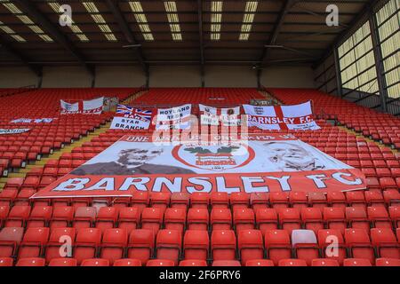 Barnsley flags strewn across the Ponty End stand at Oakwell Stock Photo ...