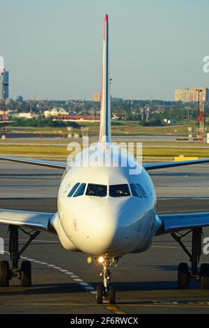 Airplane wing shadow on tarmac Stock Photo - Alamy