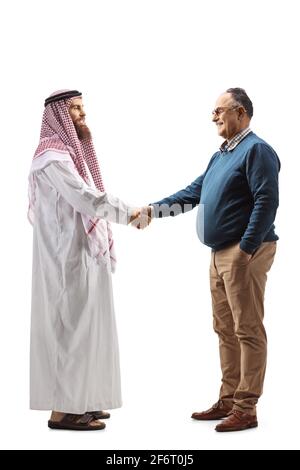 Saudi arab man shaking hands with punk isolated on white background ...