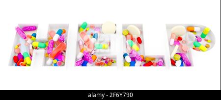 Help lettering, medication container and pills in the form of help ...