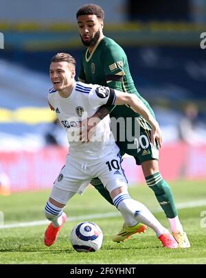 Leeds United's Jayden Bogle (right) scores their side's second goal of ...