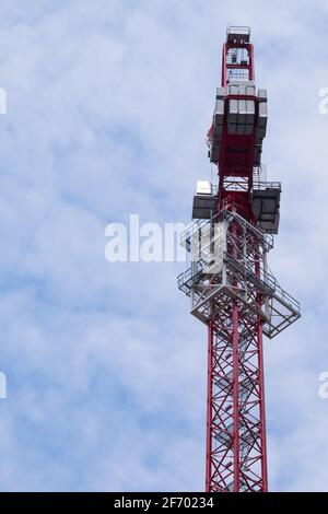 Crane. Construction crane. Huge crane against blue sky Stock Photo - Alamy